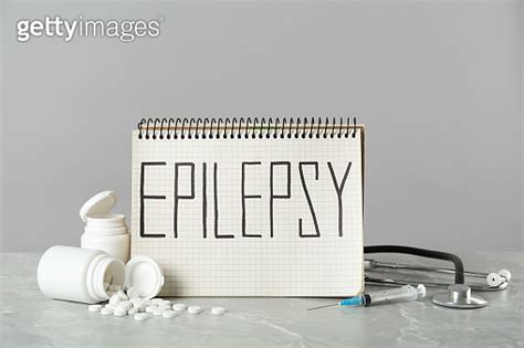 Notebook With Word Epilepsy Stethoscope Pills And Syringe On Grey Marble Table 이미지 1316203503