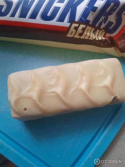 Отзыв о Шоколадный батончик Snickers White мне нравится и выглядит непривычно