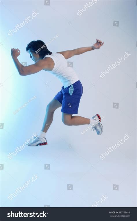 Man Running Jumping Stock Photo 580763683 Shutterstock