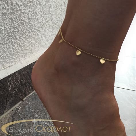 Позлатена стоманена гривна за глезен с 8 нежни полирани сърца дължина до 22 см удължител 4 см