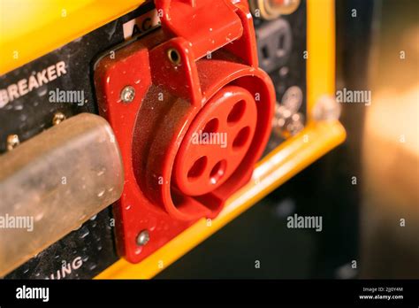 Red Three Pin Power Socket On The Gas Generator Housing Close Up Stock