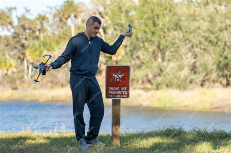 Premium Photo Operator Is Disappointed Because He Can Not Fly His Quadcopter In National Park