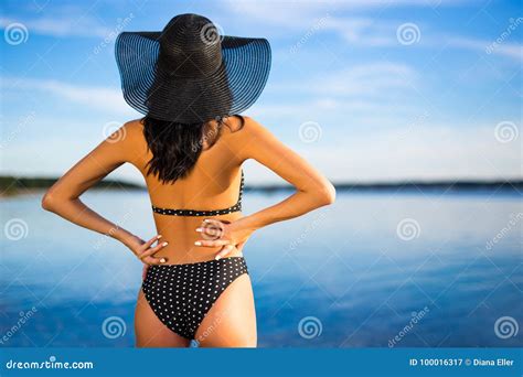 Summer Concept Back View Of Slim Woman In Bikini Posing On The Stock