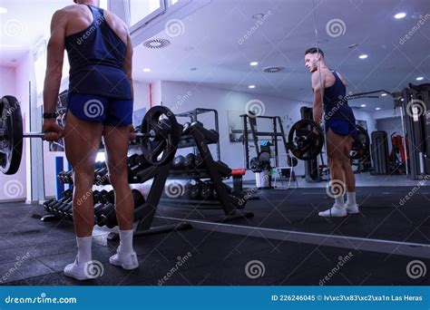 Reflection In The Mirror Of An Athlete Observing And Analyzing The