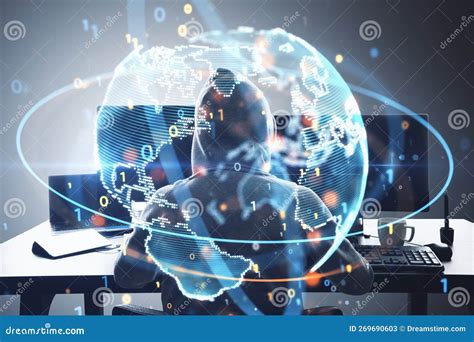 Hacker At Desktop Using Computers With Glowing Globe Hologram Global