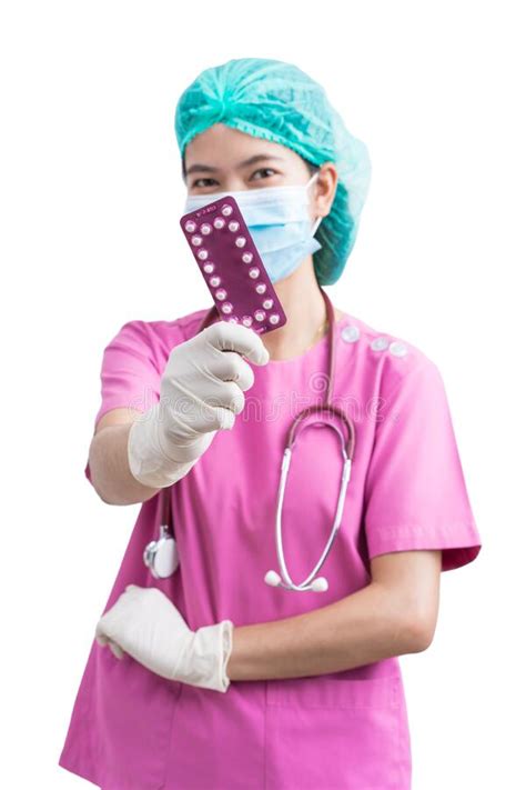 Female Doctor Holding Birth Control Pills Contraceptives In Hands For Safe Sex Concept Of