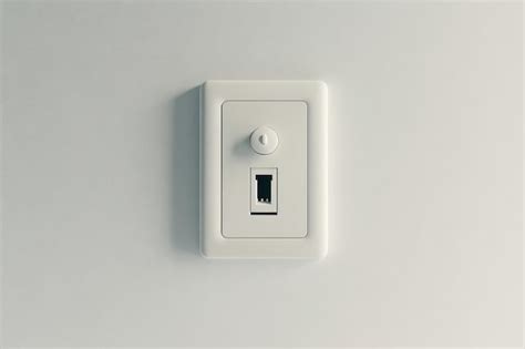 A Clean Wall With A White Ethernet Jack And Toggle Switch In A Modern Interior Space Premium