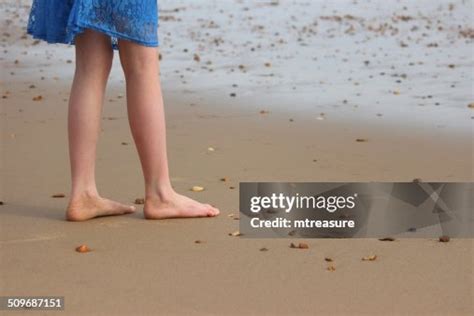 Girl Walking Barefoot On Beach Seaside Sand By Sea Waves High Res Stock
