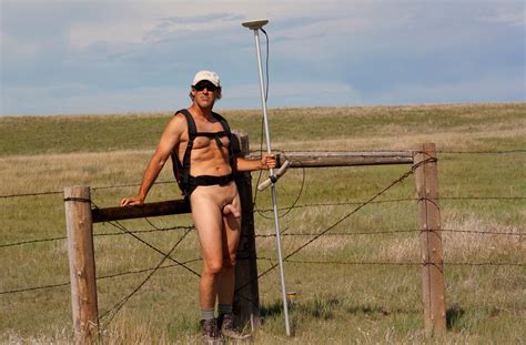 Nude Male Bored At Work Displaying Semi Erect Cock And Balls While Surveying Outdoors Pic