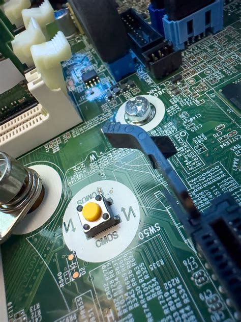 Close Up Of Circuit Board With Microchips And Other Computer Parts Cables And Circuitry Stock