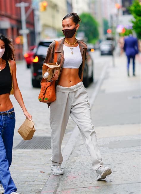 Tiktok Celebrities And Designers Are All Loving The Unbuttoned Pants Trend Teen Vogue