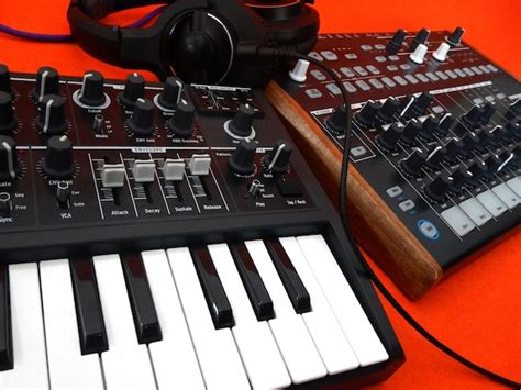 Premium Photo Music Controller Foreground Electronic Musical Instrument Or Audio Mixer Or