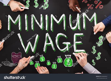 Group People Drawing Minimum Wage Blackboard Stock Photo 694684663 Shutterstock