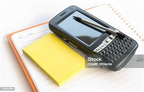 Notepad Memo Dan Pda Foto Stok Unduh Gambar Sekarang Bantalan