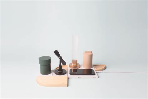 Wireless Charging Island Combines Wooden Elements With Power Pads