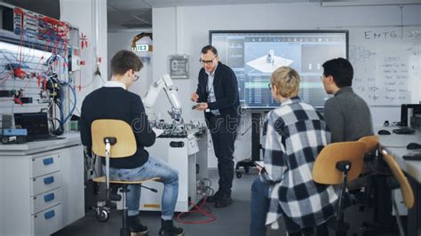 University Robotics Class White Male Teacher Explaining Engineering To