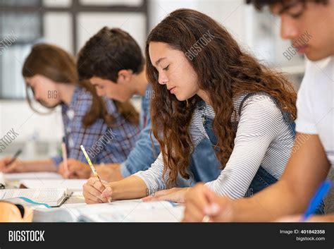 Students Studying In Class