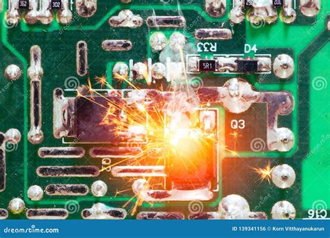 Electricity Circuit Short Burn Out Overheat Chip On PCB Stock Photo