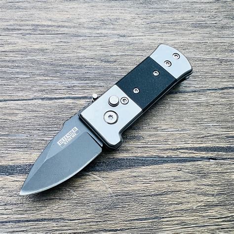 Mini Push Button Switchblade Pocket Knife Blade City