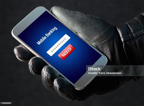 Mobile Banking Hack And Cyber Security Concept Hacker And Criminal Login To Persons Online Bank