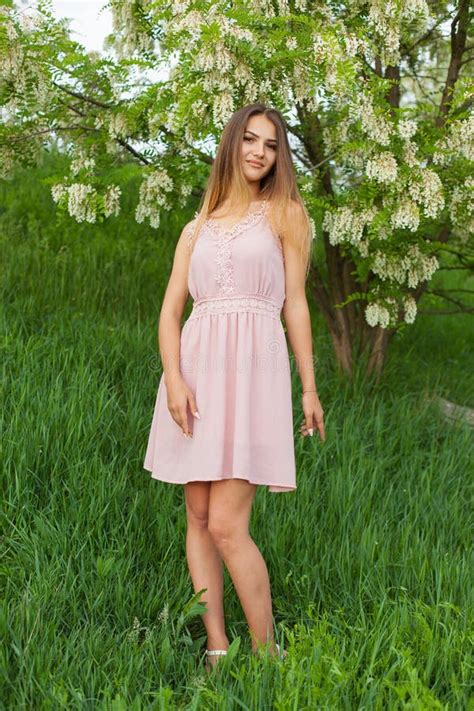 Beautiful Girl With Long Hair And Slender Figure Posing In Stock Photo Image Of Face Beauty