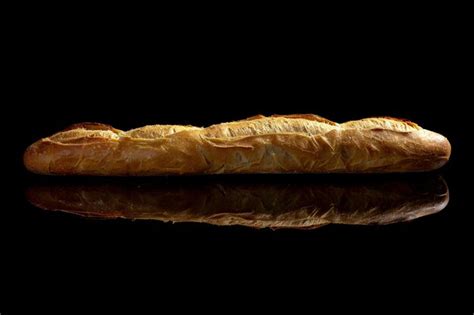 A Long Loaf Of Bread Premium Ai Generated Image