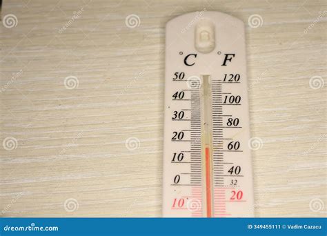 An Indoor Thermometer That Accurately Displays Temperature In Celsius And Fahrenheit Stock Image