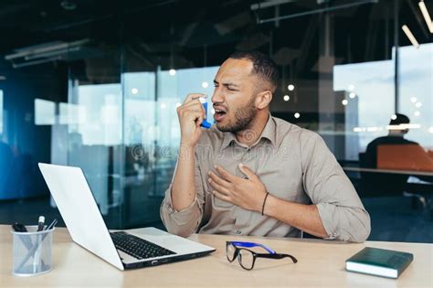 Sick Office Worker With Asthma Having Trouble Breathing Man Using