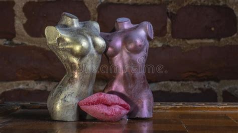 Chocolate Figures In The Form Of A Naked Female Body On A Chessboard