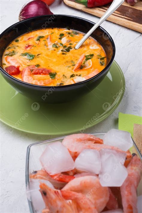 Famous Delicious Thai Tom Yum Spicy Soup With Shrimps Photo Background