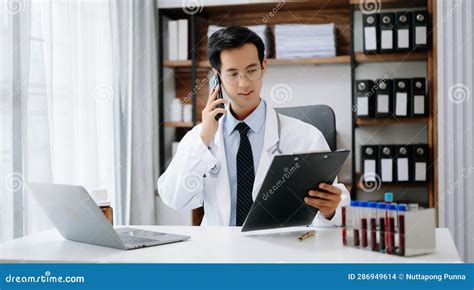 Man Doctor Phone Call Healthcare Talking And Medical Service Writing Sick Note Surgery