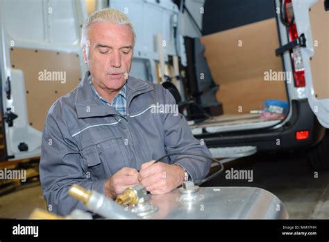 Man Connecting Cable Stock Photo Alamy