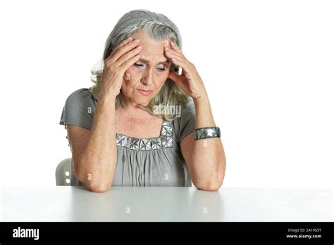 Sad Senior Woman Posing Isolated On White Background Stock Photo Alamy