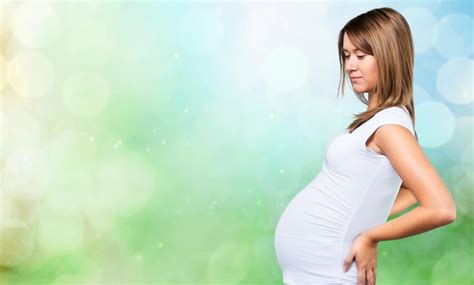 Premium Photo Close Up Of Cute Pregnant Belly