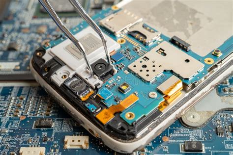 Repairing And Upgrade Mobile Phone Electronic Computer Hardware And Technology Concept Stock