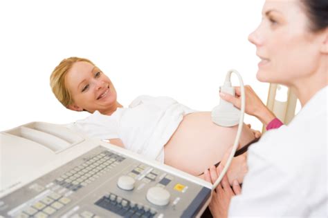 Pregnant Woman Getting Ultrasound From Doctor Ultrasound People Health