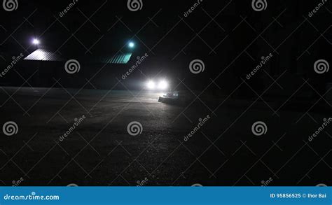 The Car Rides To The Building At Night Lights Shine Car Calls In The
