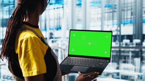 Smart Factory Engineer Implements Automated Workflows Using Mockup Laptop Stock Footage Video