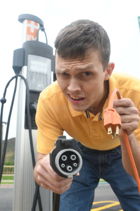 Man Charging His Electric Vehicle Stock Image Image Of Capacity Volts 254261297