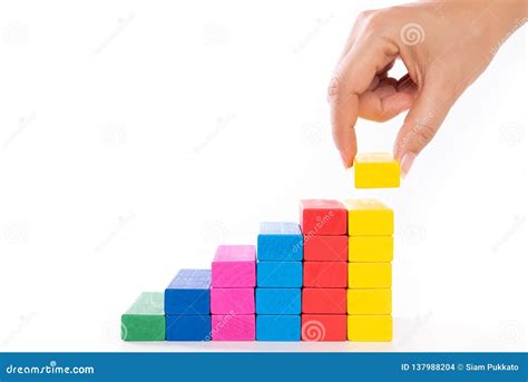 Concept Of Building Success Foundation Women Hand Put Wooden Blocks In The Shape Of A Staircase