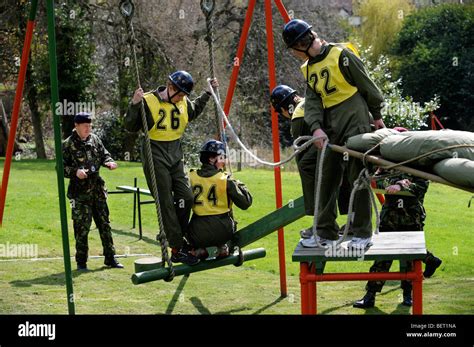 Boys Are Assessed During A Team Physical Problem Solving Exercise At