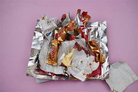 Vacie Las Envolturas Dulces Las Barras De Caramelo De Las Risitas Y De Marte Imagen De Archivo