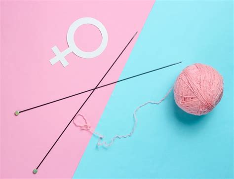 Premium Photo Knitting Needles Ball Of Yarn Female Gender Symbol On