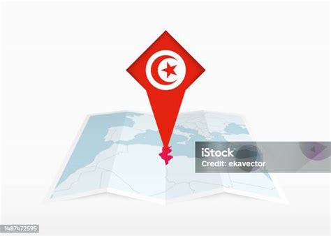 튀니지는 접힌 종이지도와 튀니지 국기와 함께 고정 된 위치 마커에 묘사되어 있습니다 관광에 대한 스톡 벡터 아트 및 기타 이미지 관광 관광객 기 Istock