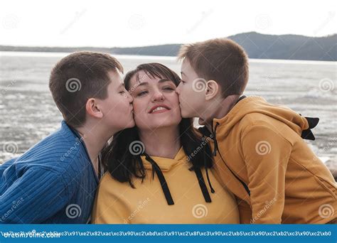 Mom And Two Sons On The River Bank Stock Image Image Of Game Shore