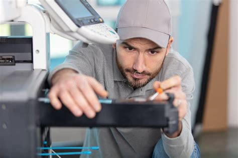 Man Technician Repairing Printer At Business Place At Work Stock Photo Image Of Occupation