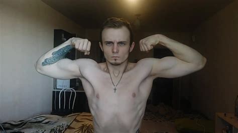 Young Russian Guy Posing With Muscles Flex Show