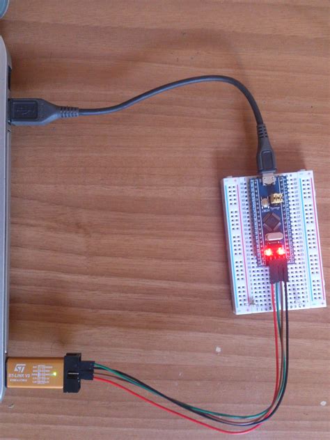 running nuttx on a less than u 2 00 board alan c assis