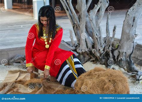 Beautiful Maldivian Woman In National Dress Making Ropes Editorial