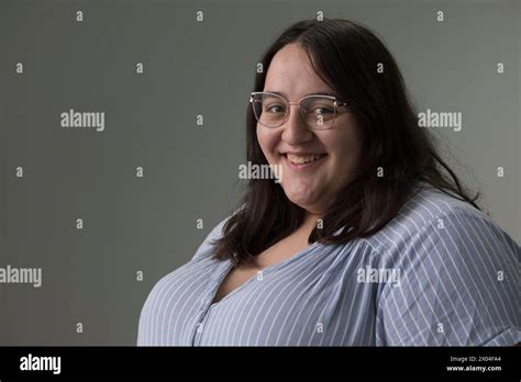 Vertical Portrait With Soft Background Of Young Overweight Girl With